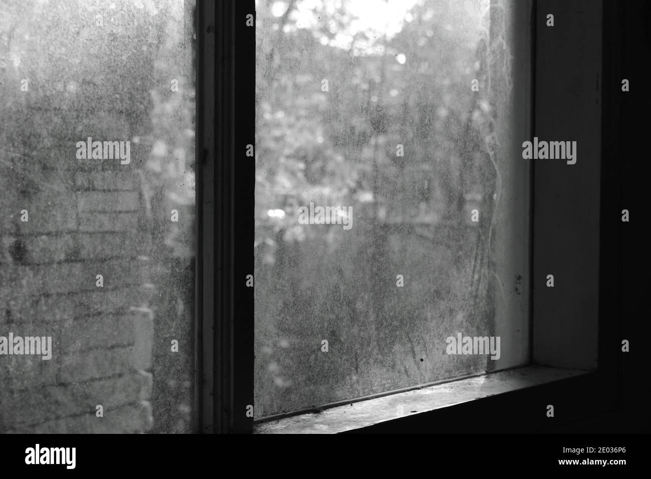 stain and dust on glass window frame in home with monochrome tone Stock ...