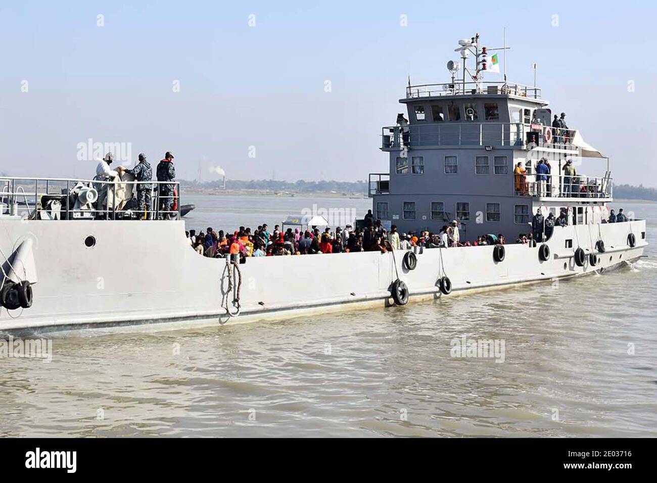 Rohingya refugees sit on a Bangladesh Navy ship as they are relocated ...