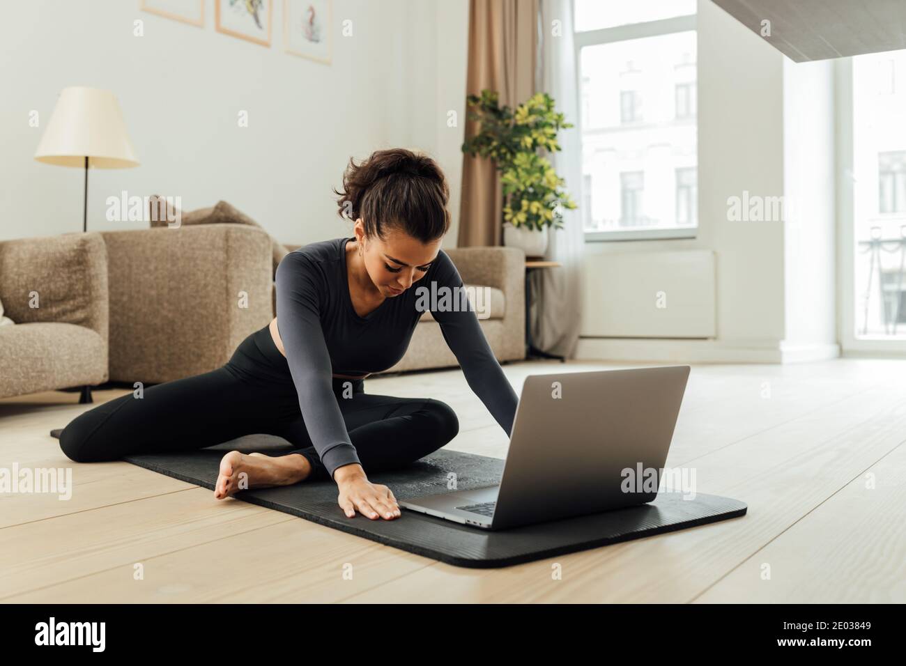 Young middle east woman doing yoga exercise at home. Female in ...
