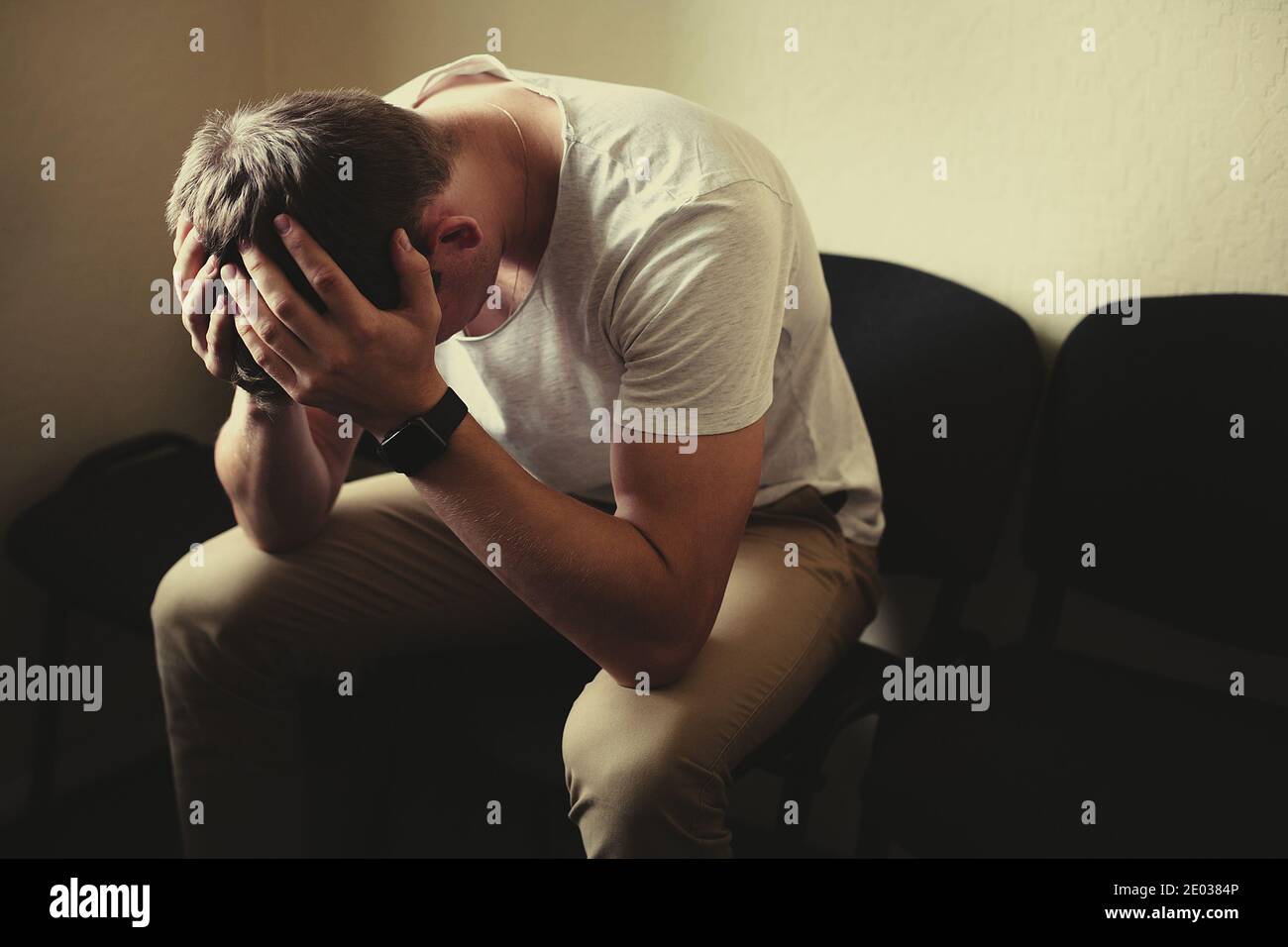 Despair man chair hi-res stock photography and images - Alamy
