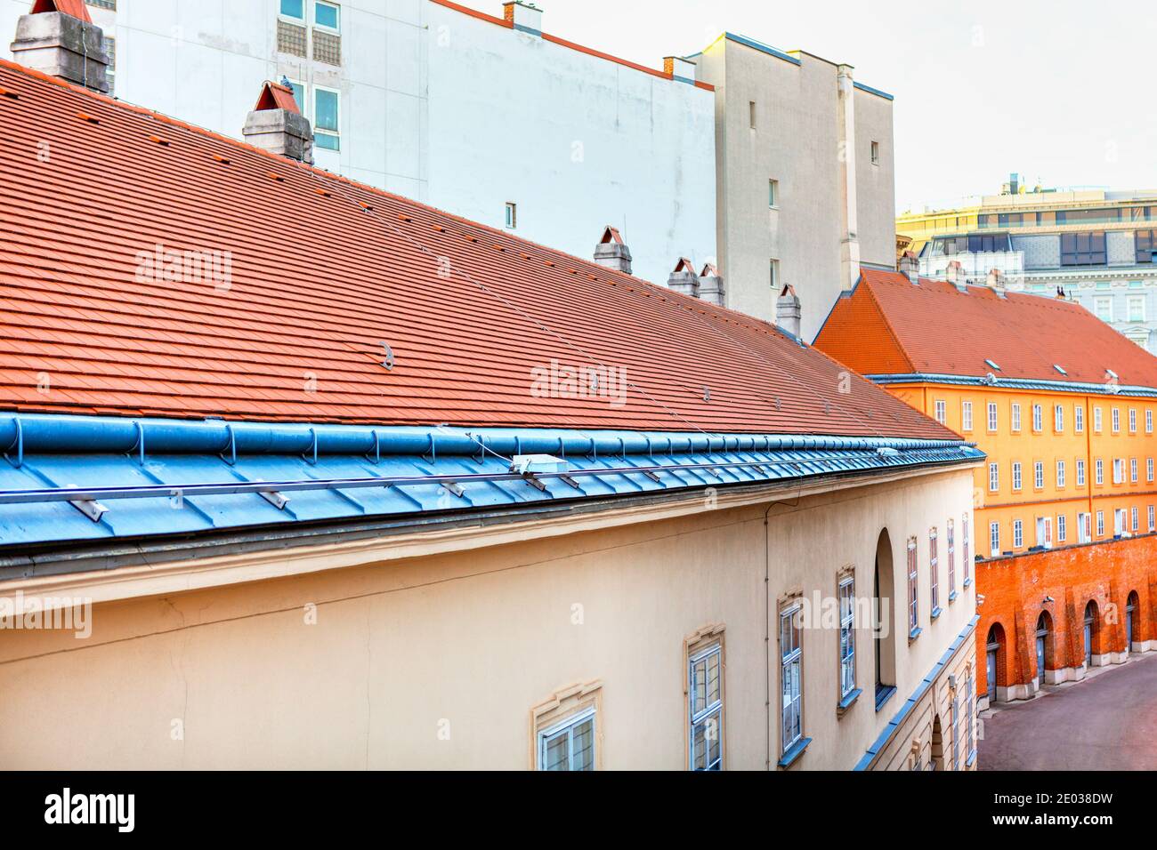 Side view of street with buildings . Walls windows and arches Stock ...