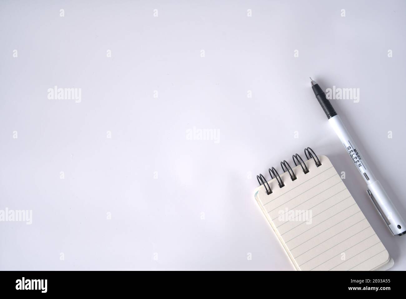 Pen and notebook isolated on white background, copy space for text ...
