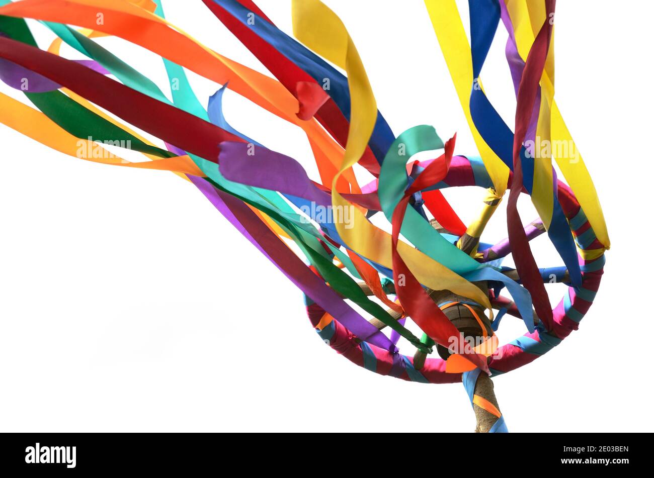 Big festive cart wheel with colorful ribbons isolated on white ...