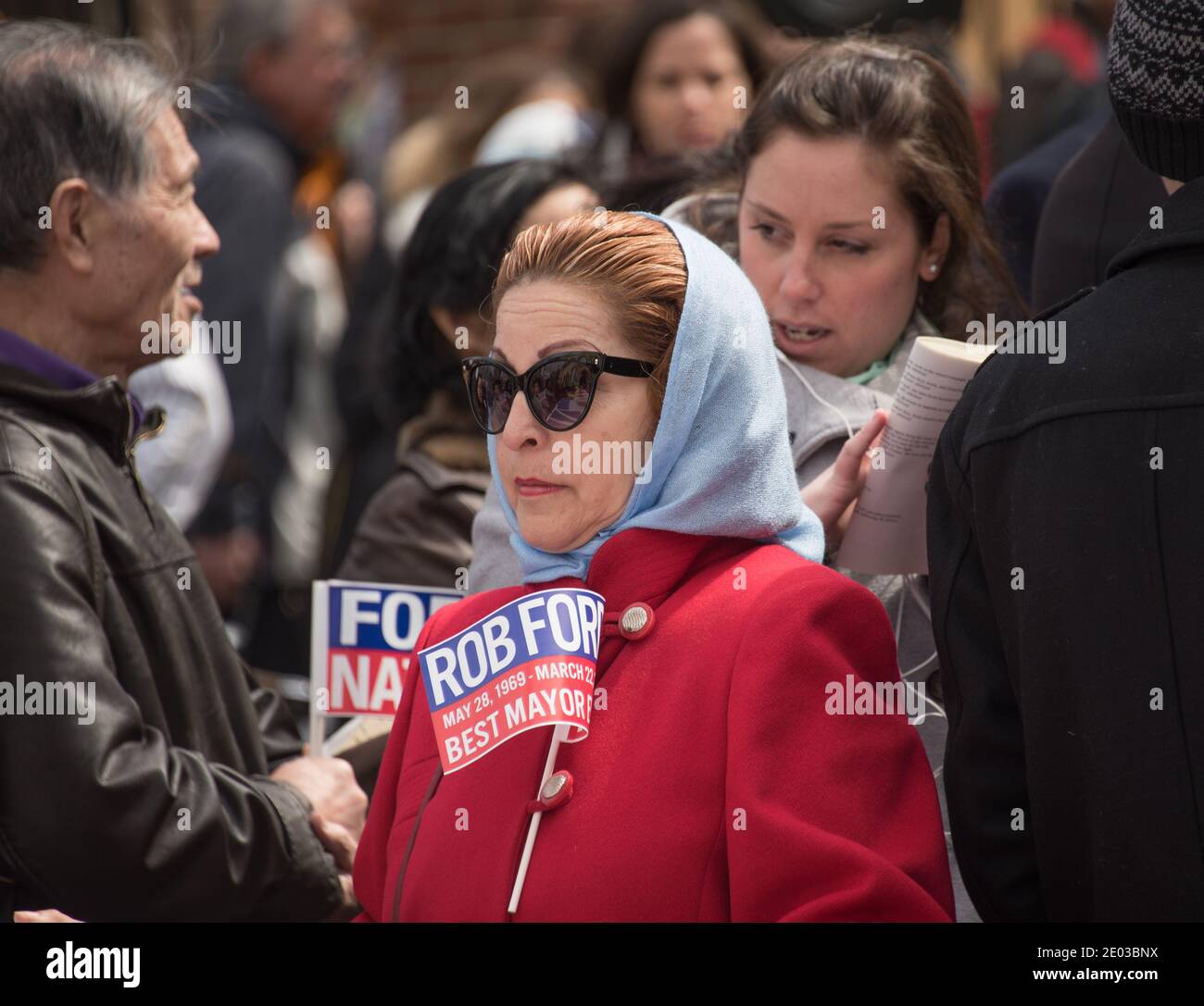 Rob Ford supporters with signs marching from City Hall to the St. James ...