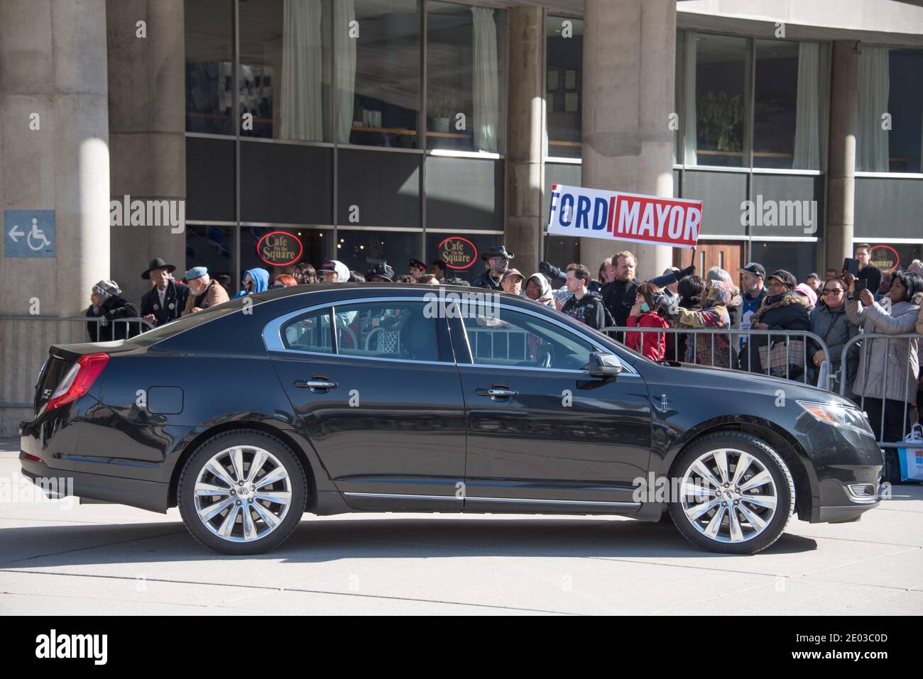 Supporters of Rob Ford and car part of the funeral ceremony. Rob Ford ...