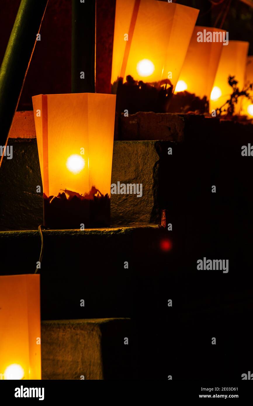 Luminaries glowing at night and set up on stairs to guide visitors ...