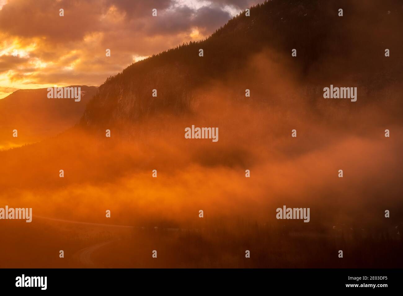Sunrise lighting up the fog-Canadian Rockies Stock Photo - Alamy