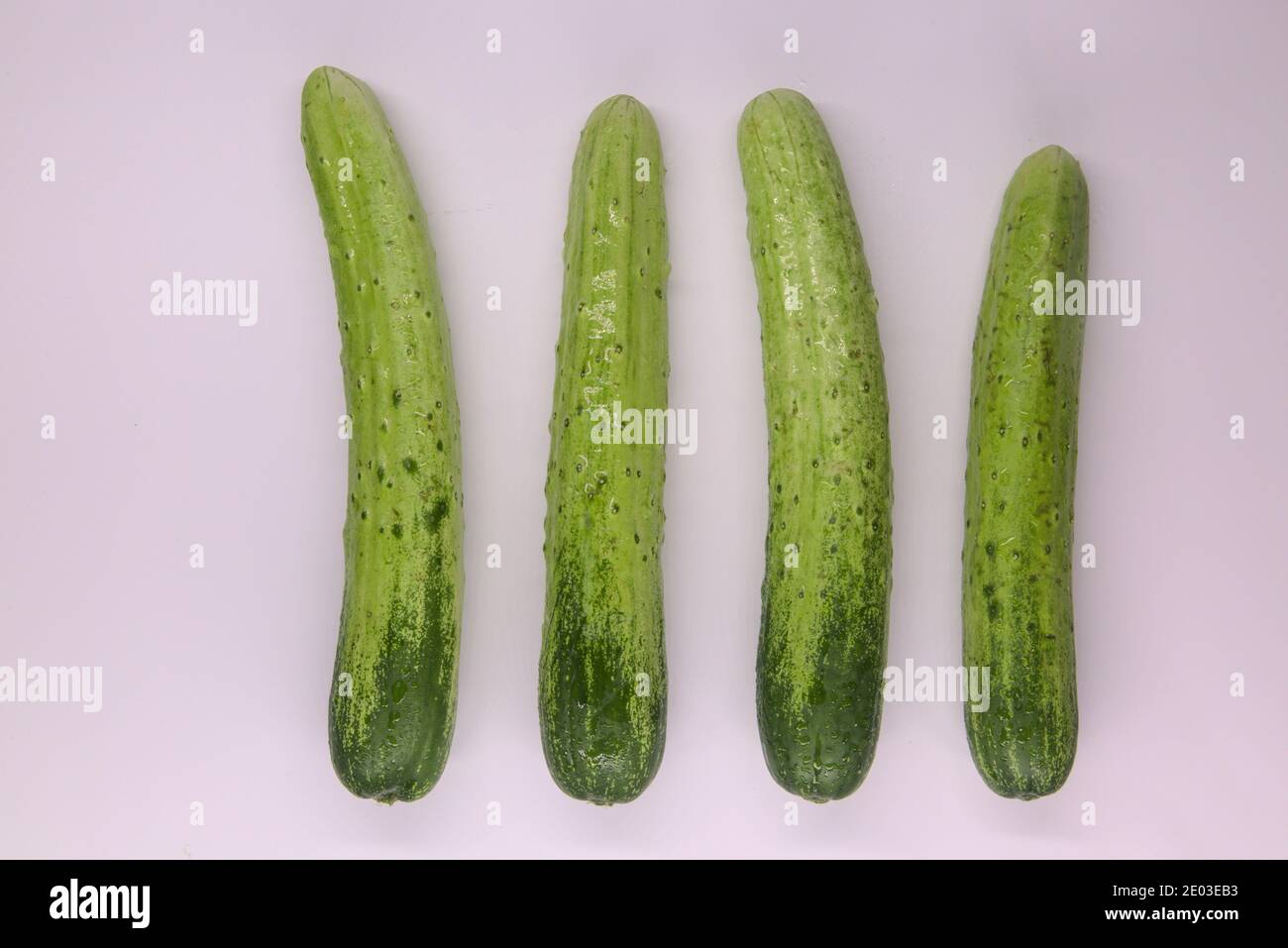 Four cucumbers hi-res stock photography and images - Alamy