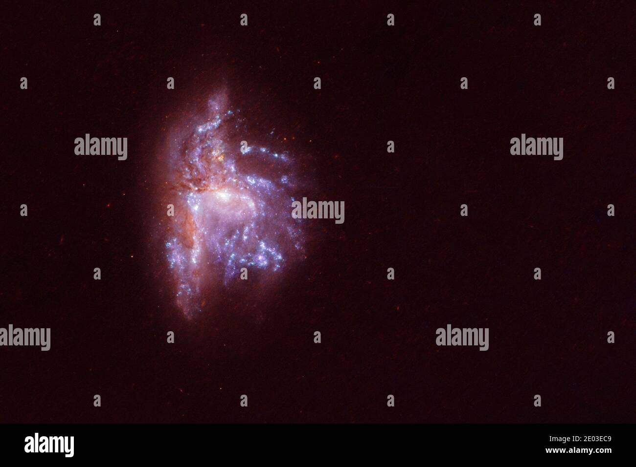 A blue galaxy with stars and nebulae. Elements of this image were ...
