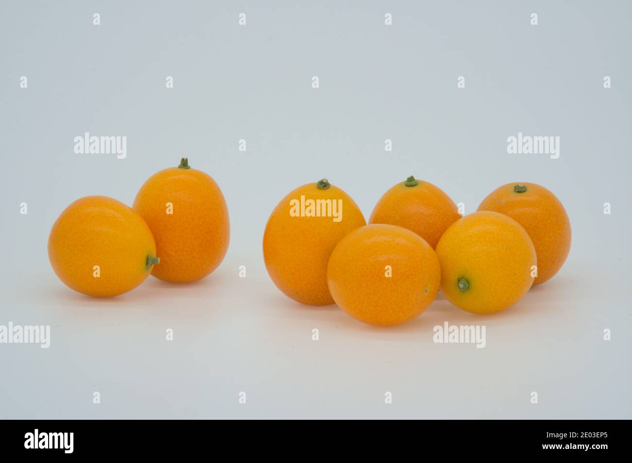 Fresh ripe cumquat or kumquat fruit isolated on white background ...
