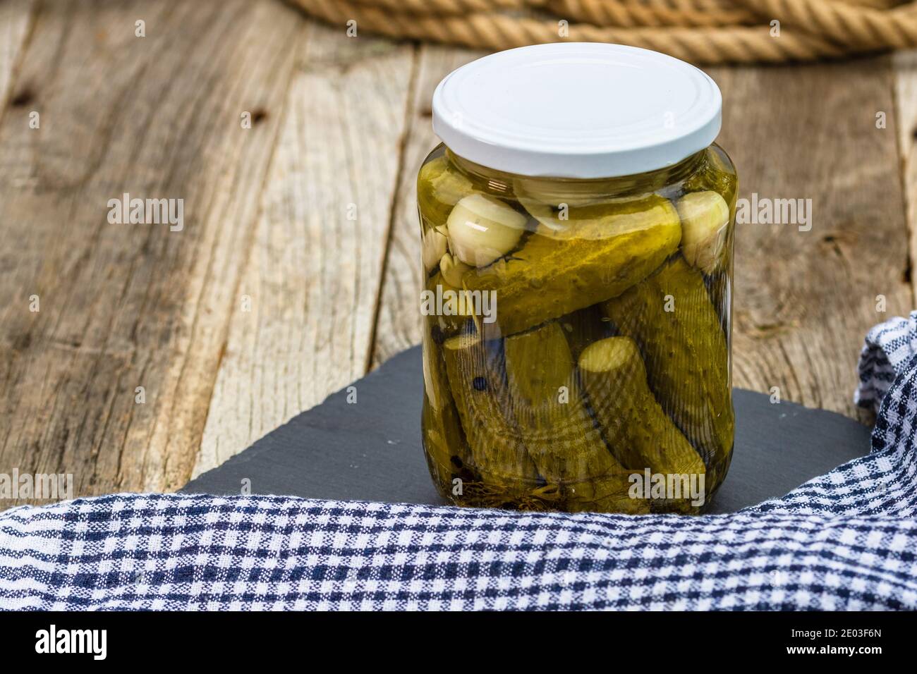 Close up of glass jar with pickles isolated. Preserved food concept ...