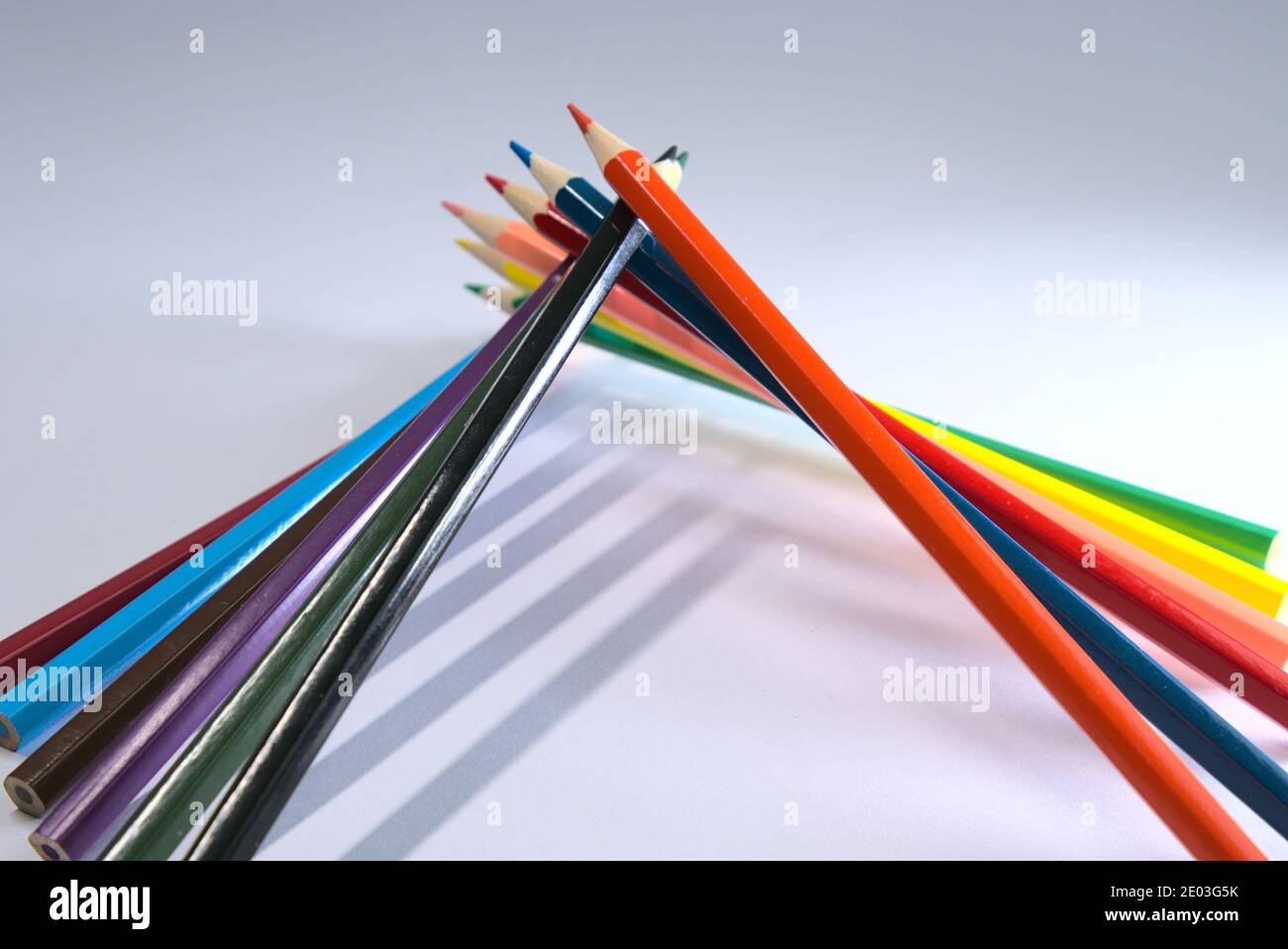 Colored pencils put together, unity and cooperation concept, creativity ...