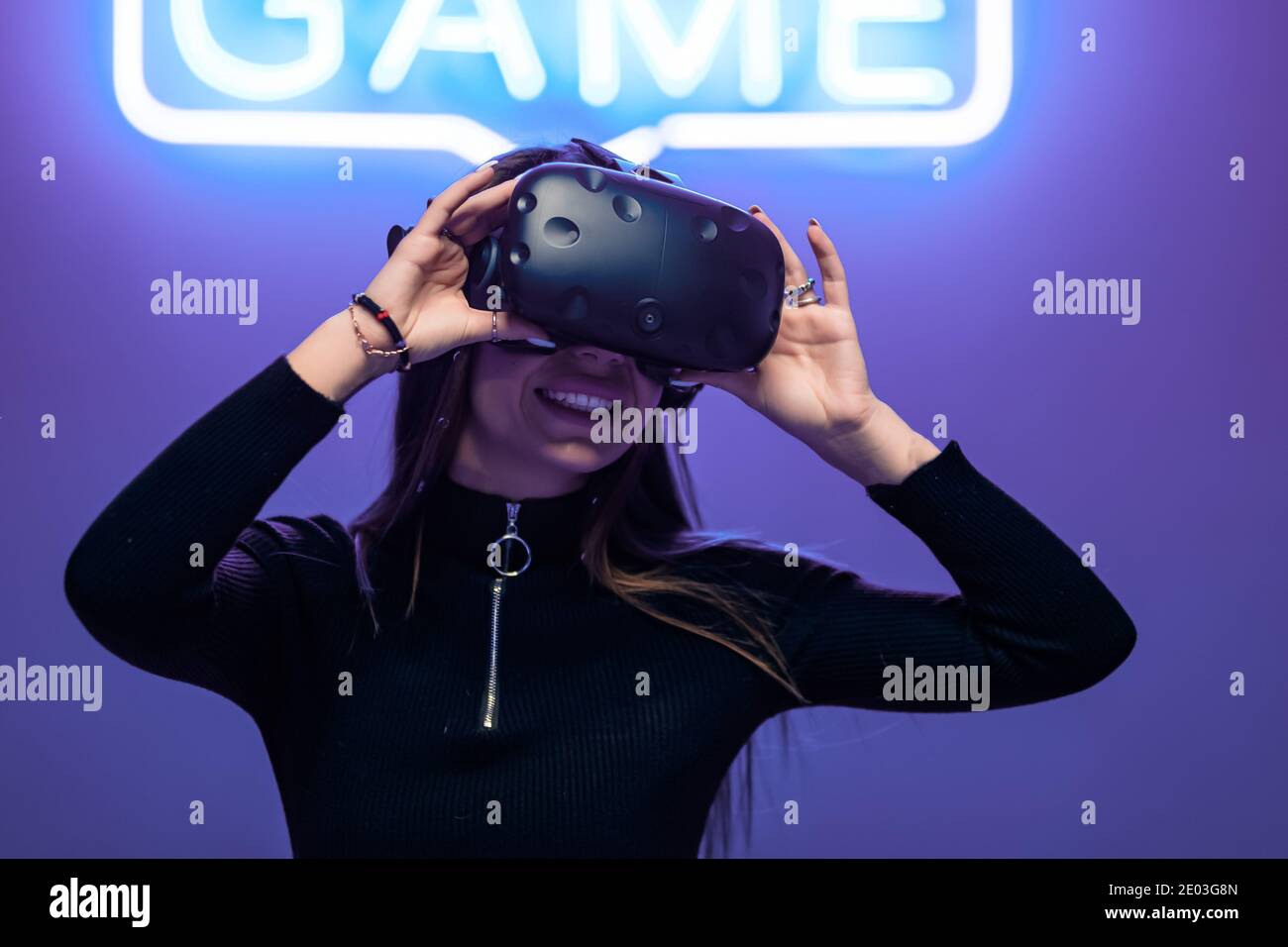VR game in a neon room Stock Photo - Alamy
