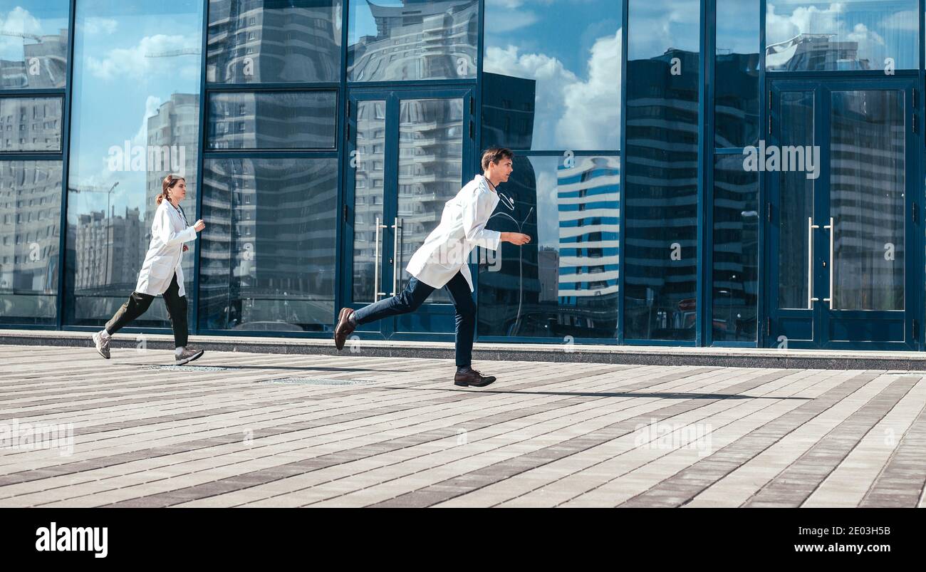 Rushing to help hi-res stock photography and images - Alamy
