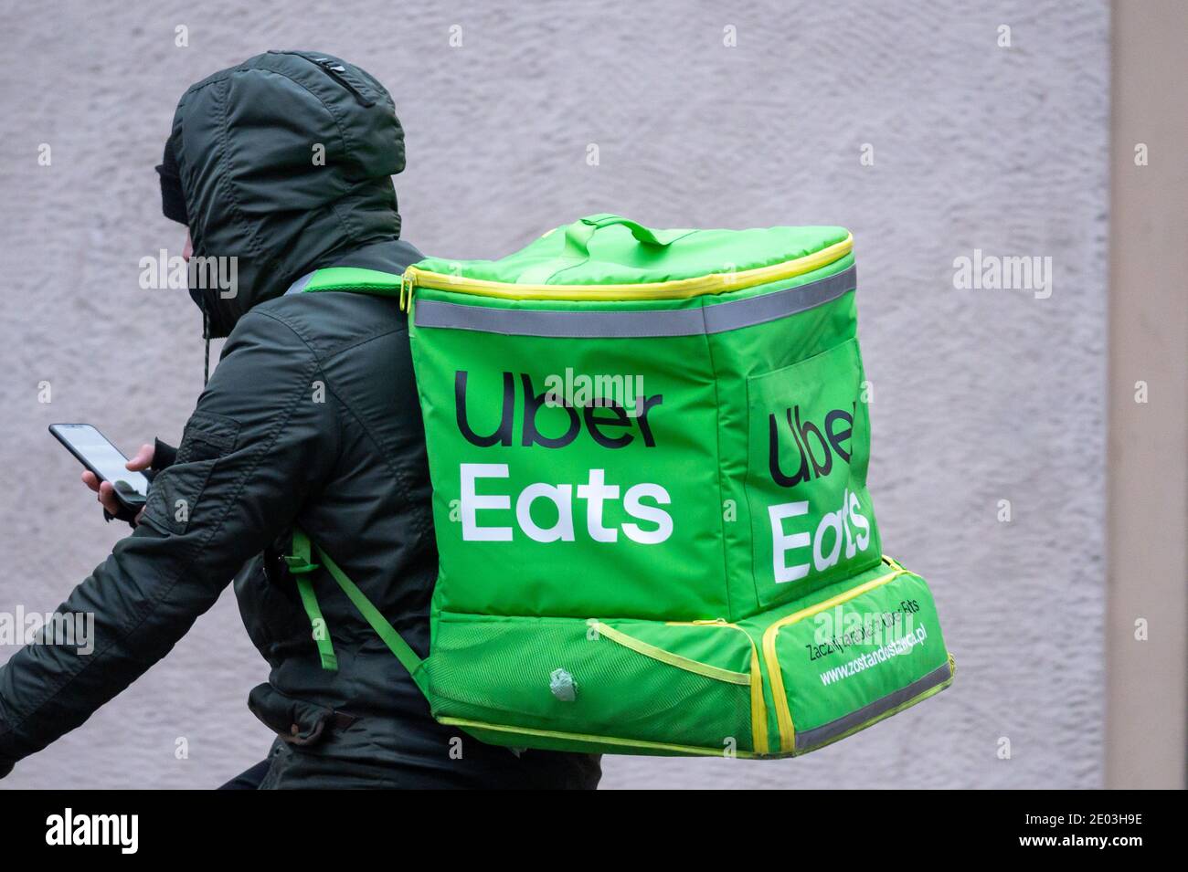 An Uber eats rider at work in Kraków, Poland Stock Photo - Alamy