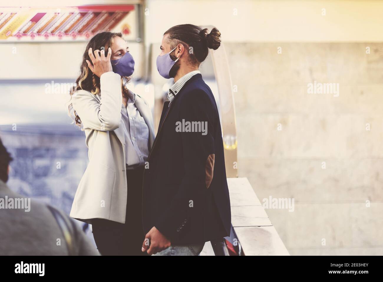couple in love embraces in the subway crossing Stock Photo - Alamy