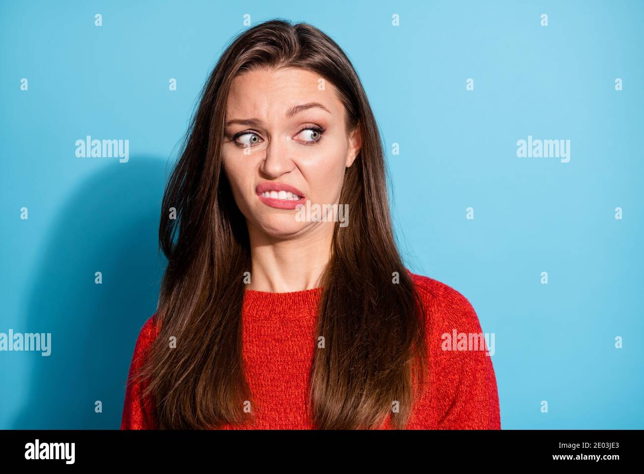 Photo of lady look side empty space showing disgust wear red knitted ...