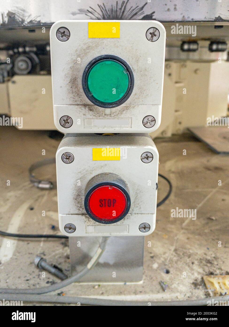 Green and Red Stop Buttons at Machine Control Stock Photo - Alamy