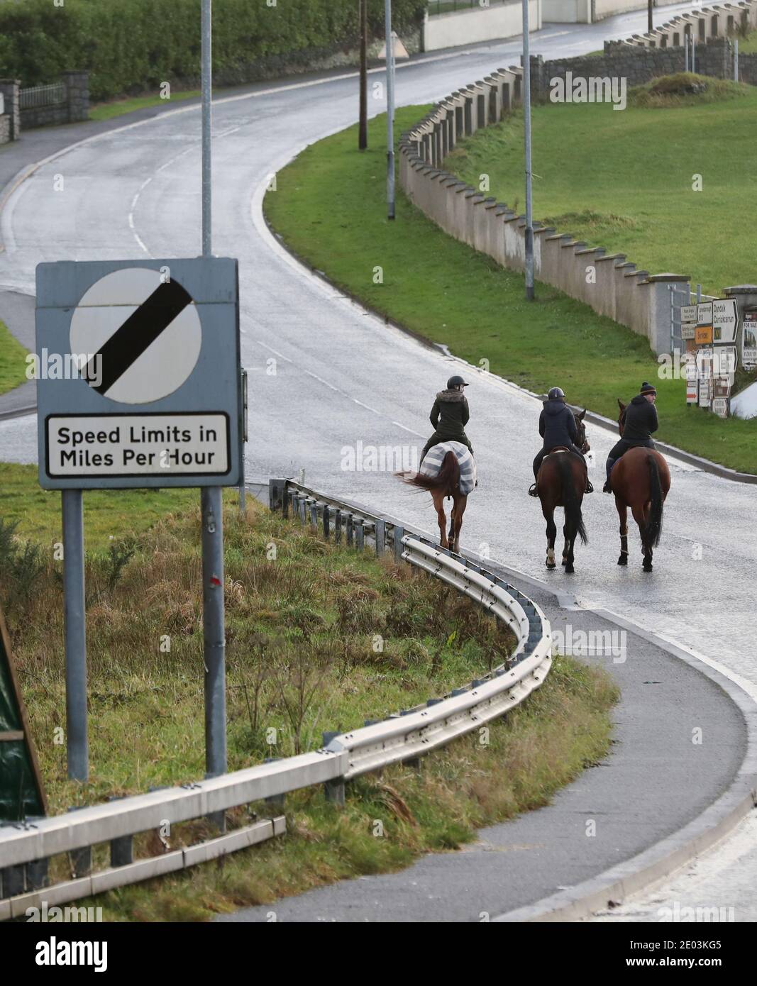 A group of horse riders crosses the border from the Republic of Ireland ...