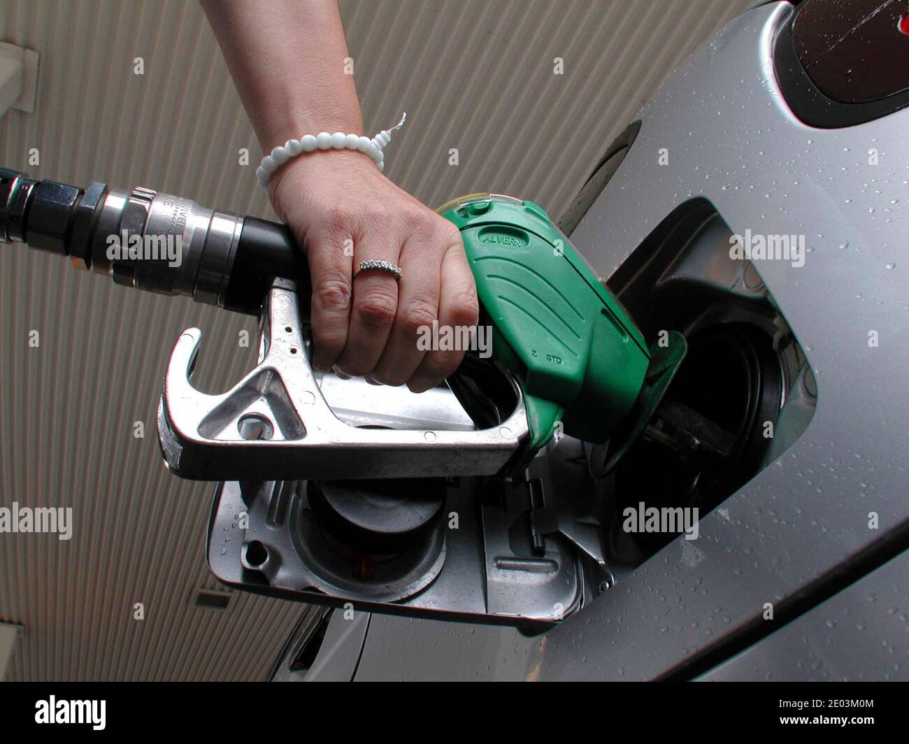 Filling a car at Petrol pump fuel station Epping Essex Stock Photo - Alamy
