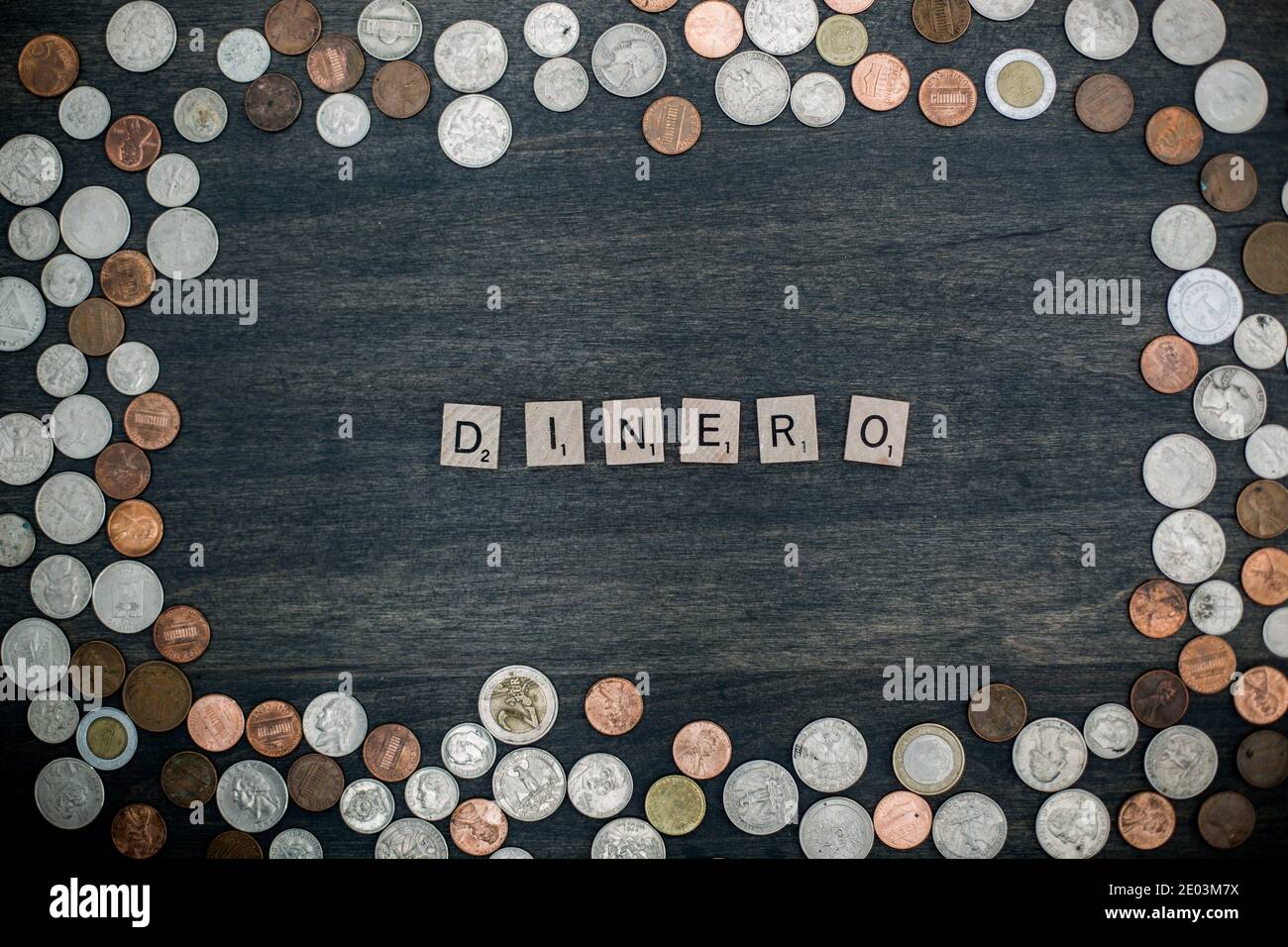 dinero spanish money letter tiles Stock Photo - Alamy