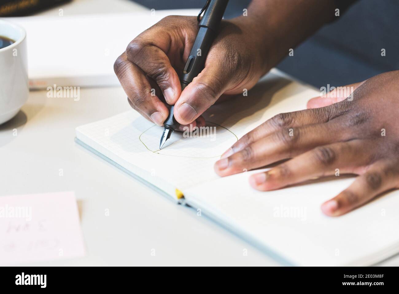 drawing in notebook Stock Photo - Alamy