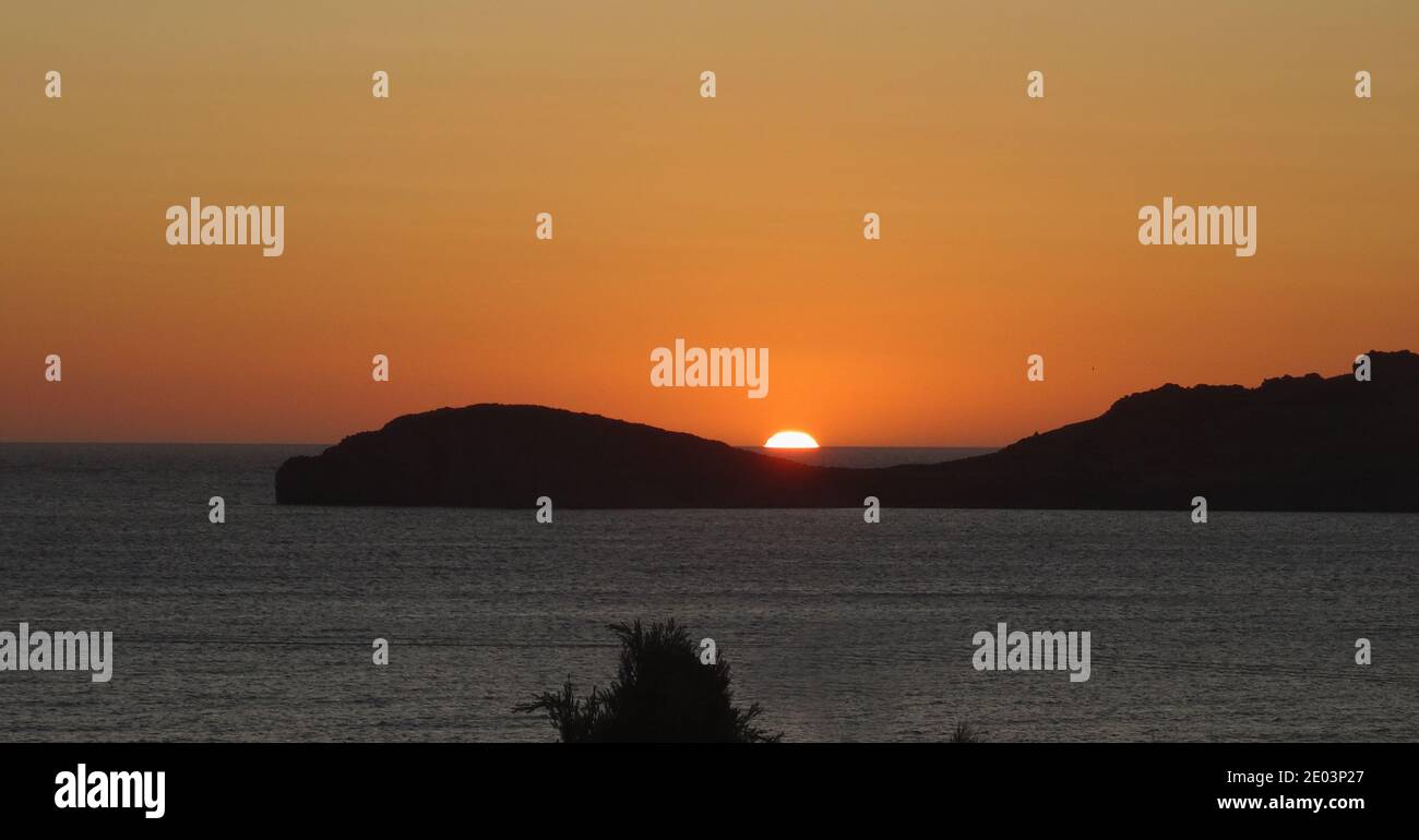 Sunset on Plati Beach , Myrina, Lemnos Island in the Greek Islands with ...