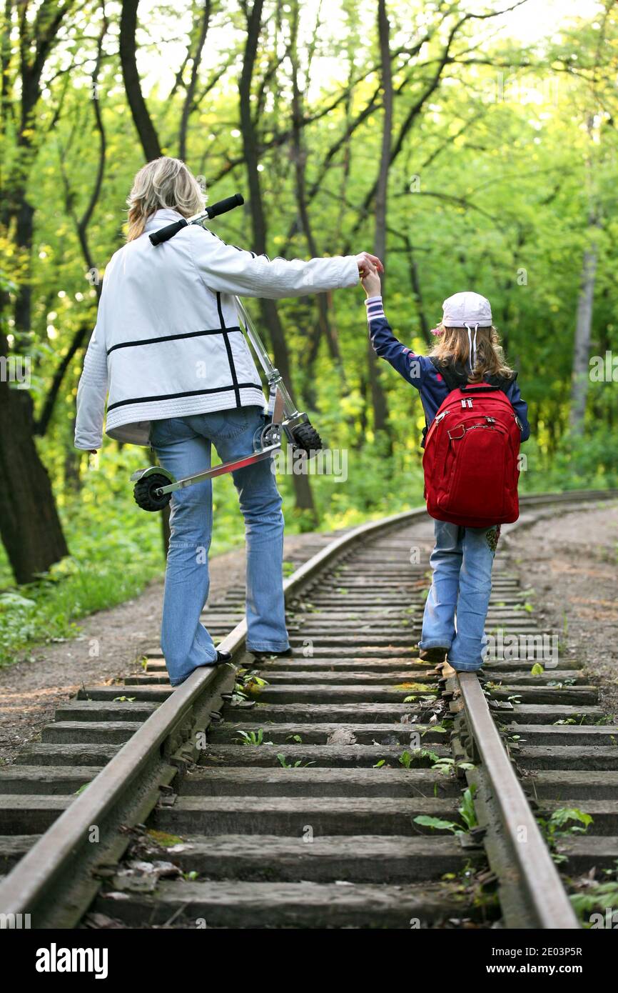 Child walking on railway hi-res stock photography and images - Alamy