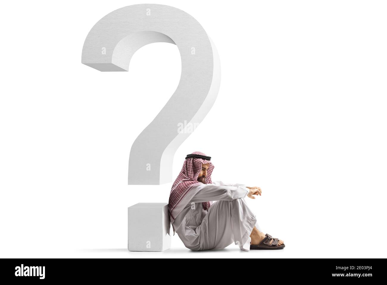 Pensive arab man sitting on the floor and leaning on a question mark ...