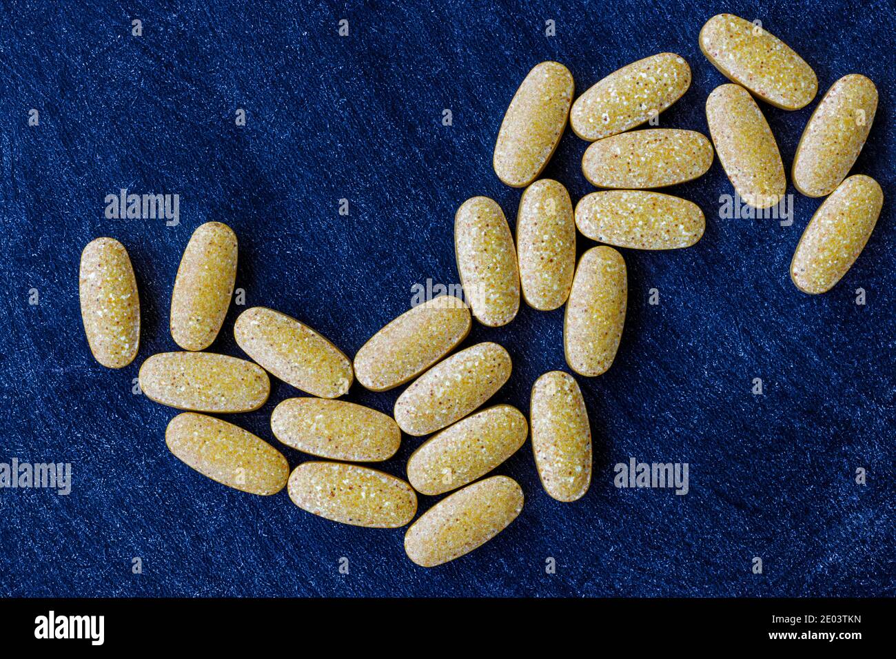 close-up of multivitamin and mineral supplement tablets. dietary ...
