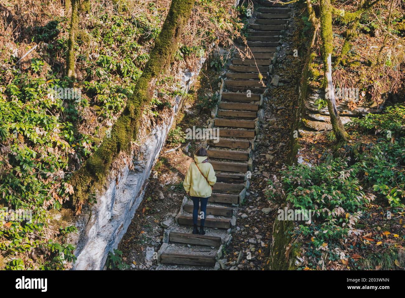Woman walking upstairs in hi-res stock photography and images - Alamy