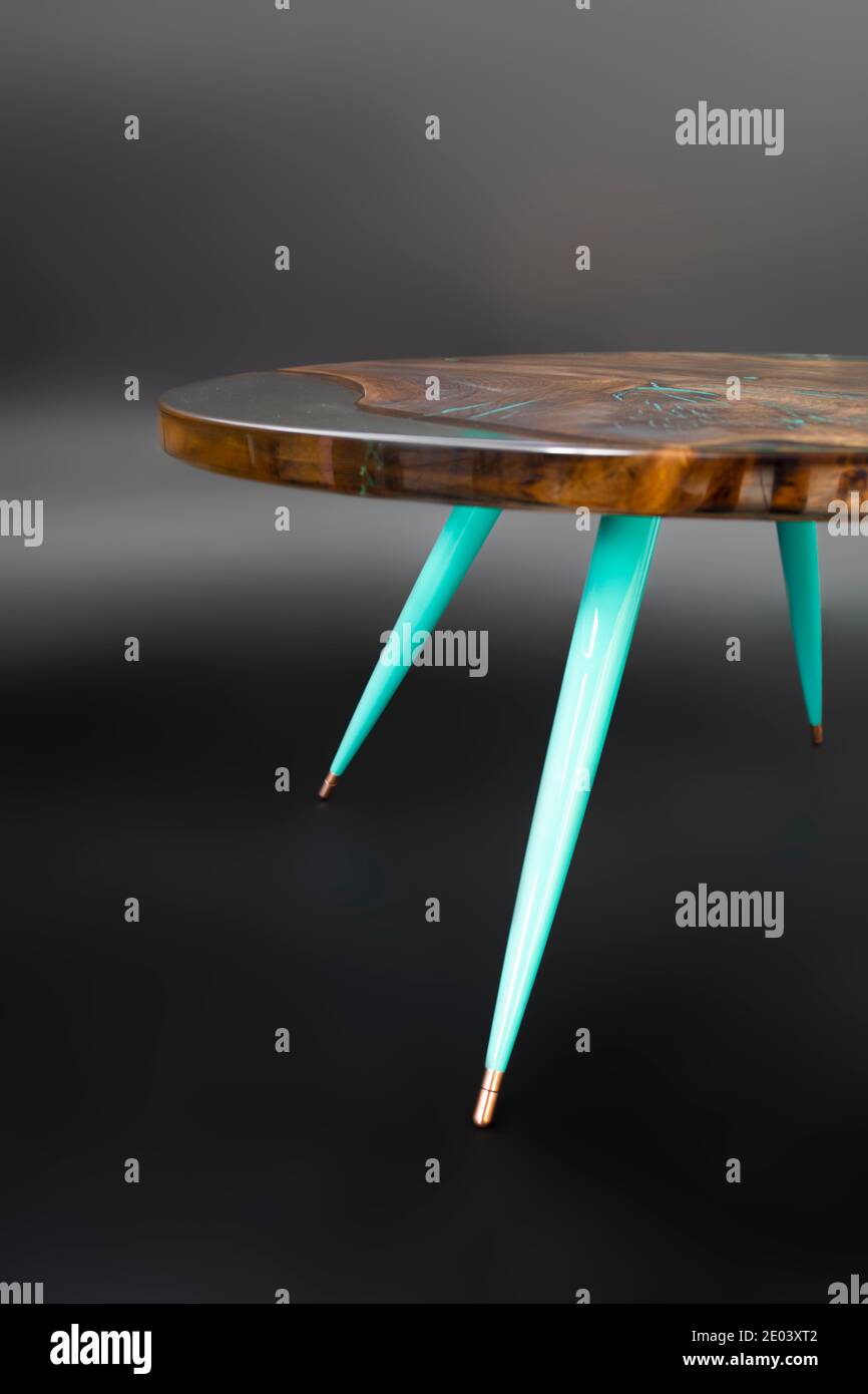 Modern handmade table made from walnut tree Stock Photo - Alamy
