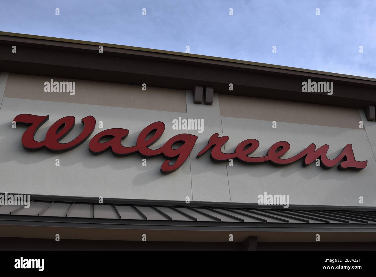 Walgreens sign with blue sky Stock Photo - Alamy