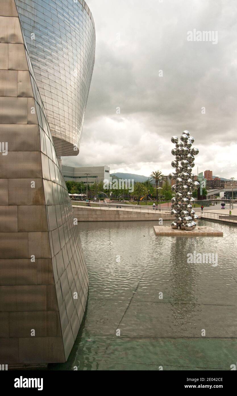 Titanium wall, steel bubbles, Tall Tree and The Eye, sculpture by Anish ...