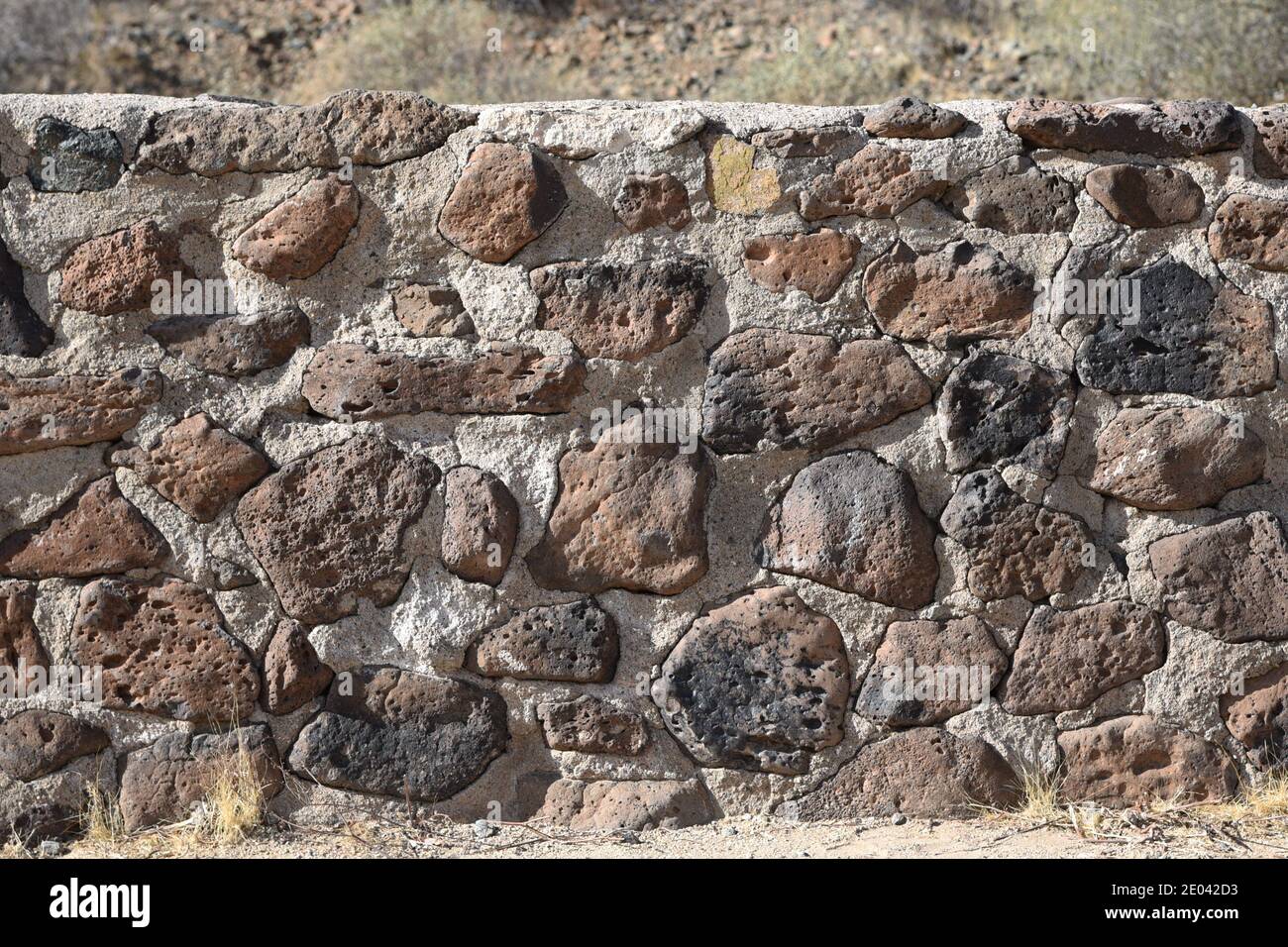 Stone and cement retaining wall Stock Photo - Alamy