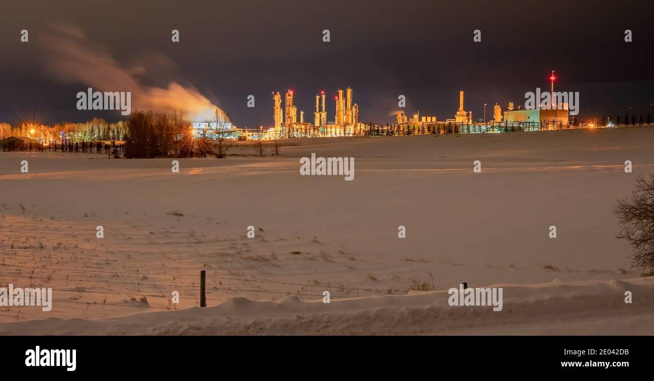 Night view of a pipeline extraction plant near Cochrane, Alberta ...