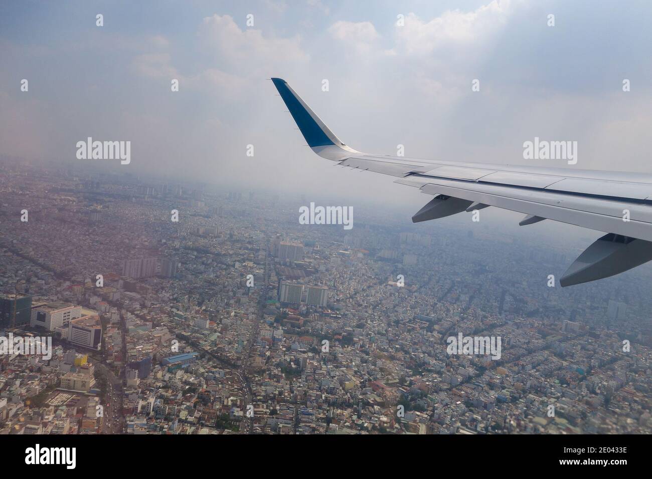 A view out of the window of a Vietnam Airlines aeroplane or aircraft ...