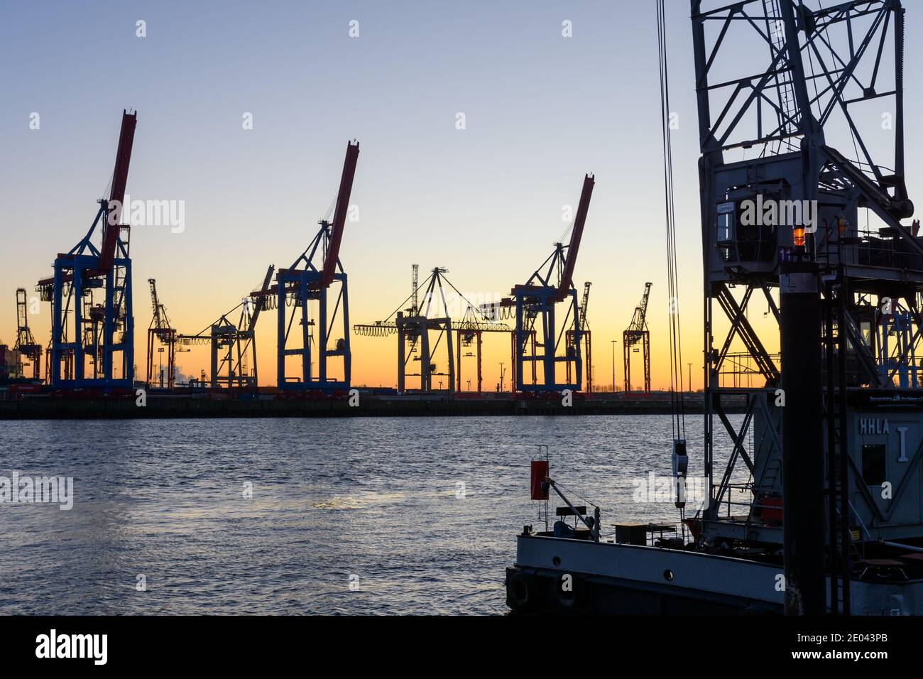 Hamburg, Germany: Shipyard cranes at the docks in the port in the ...