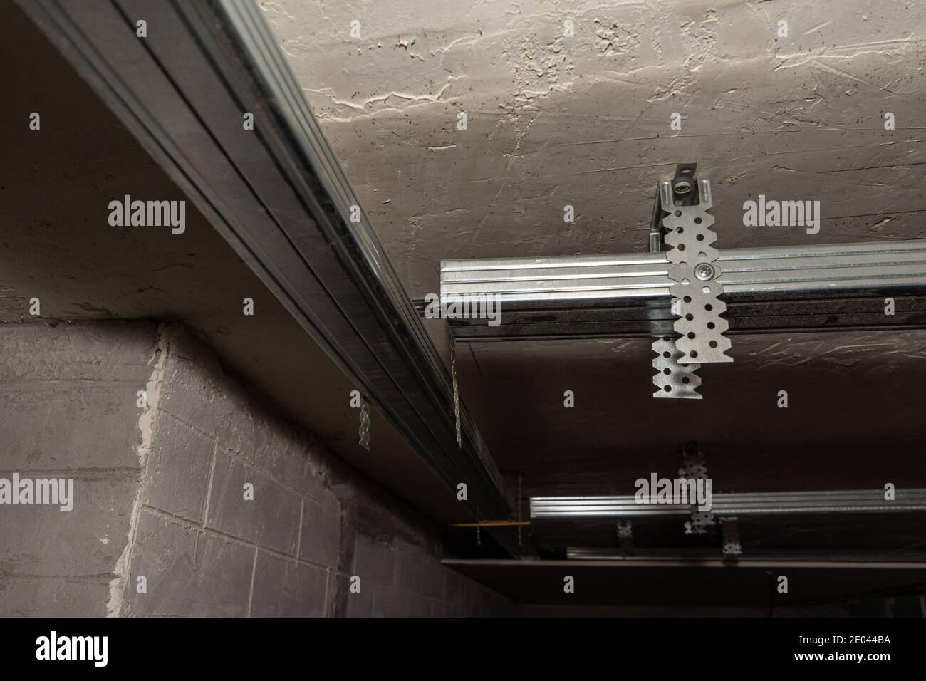 The metal frame on the ceiling for attaching sheets of drywall ...