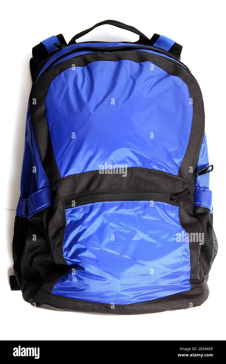 Blue backpack with black details isolated on white background. For ...