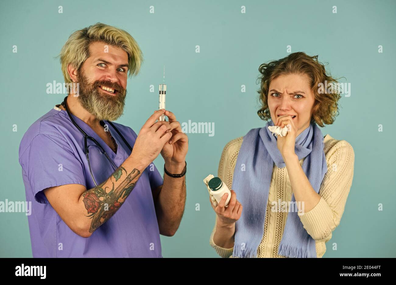 She afraid of needles. doctor and patient meeting at hospital ...