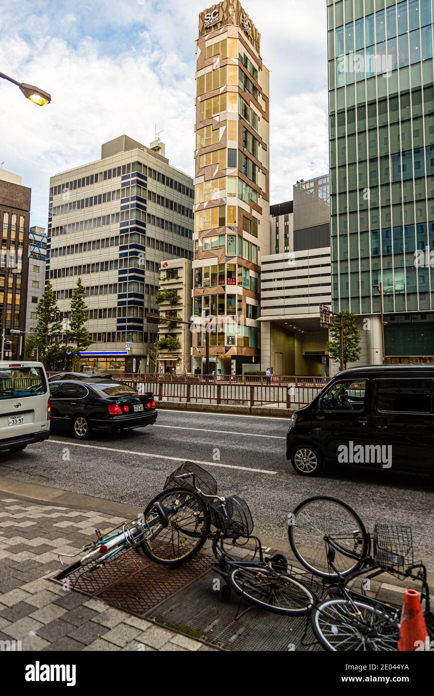 Narrow skyscraper in Tokyo, Chuo, Japan Stock Photo - Alamy