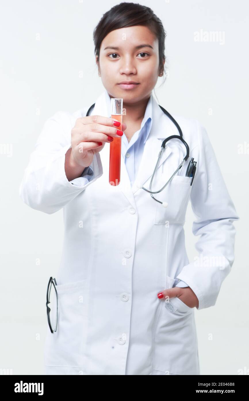 A chemist holding a flask and chemical matrix Stock Photo - Alamy