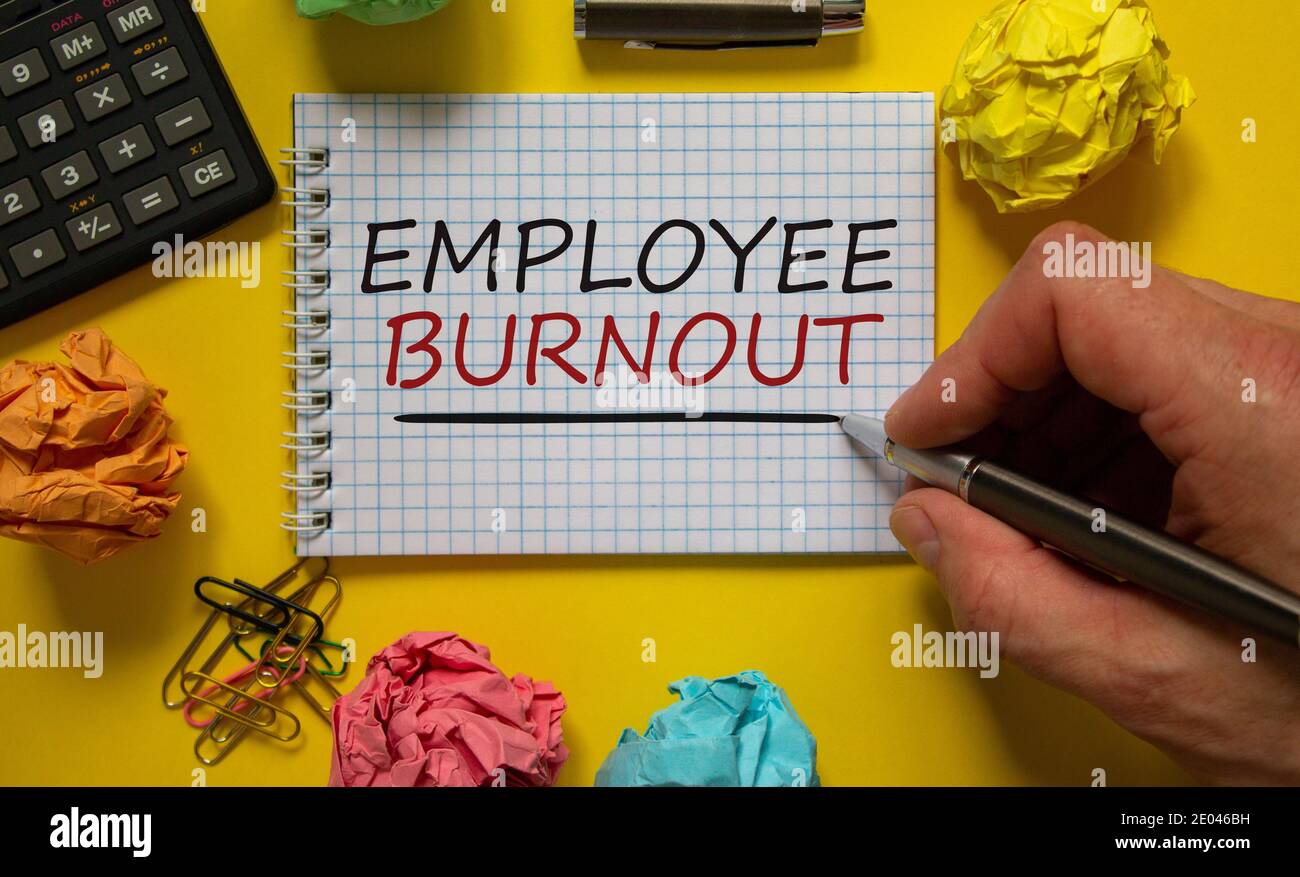 Employee burnout symbol. Mail hand writing 'Employee burnout' on white ...
