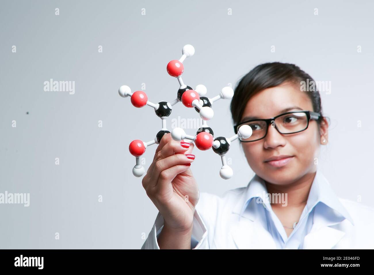 An asian female medicinal chemist holding a chemical matrix Stock Photo ...