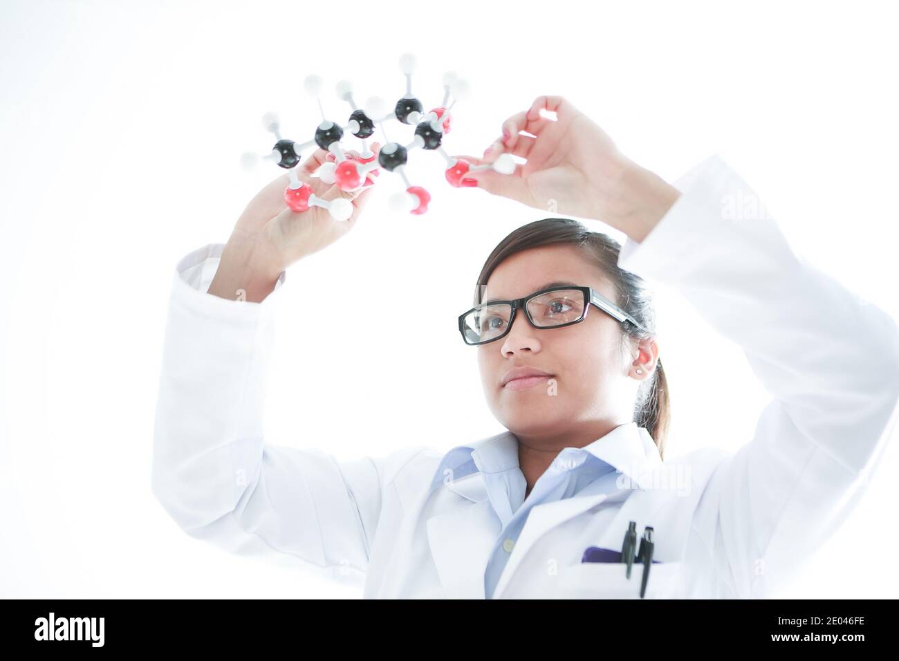 An asian female medicinal chemist holding a chemical matrix Stock Photo ...