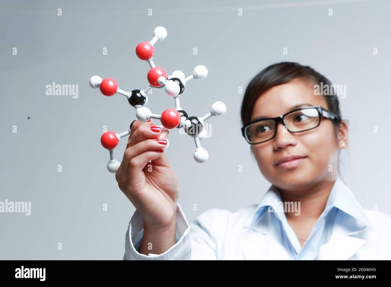 An asian female medicinal chemist holding a chemical matrix Stock Photo ...