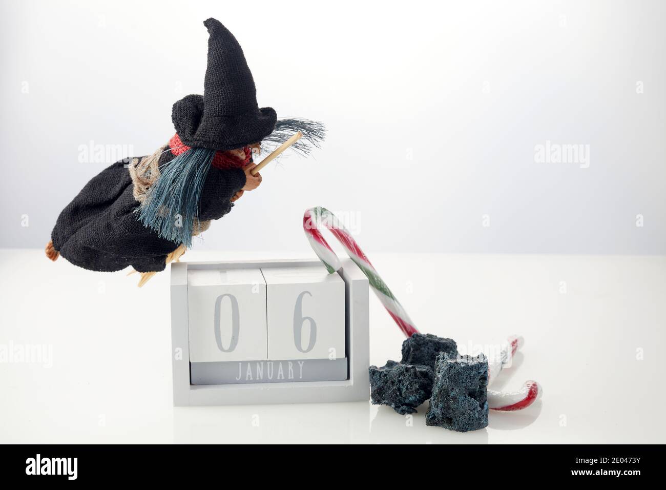 The Befana with sweet coal and candy. Italian Epiphany day tradition ...