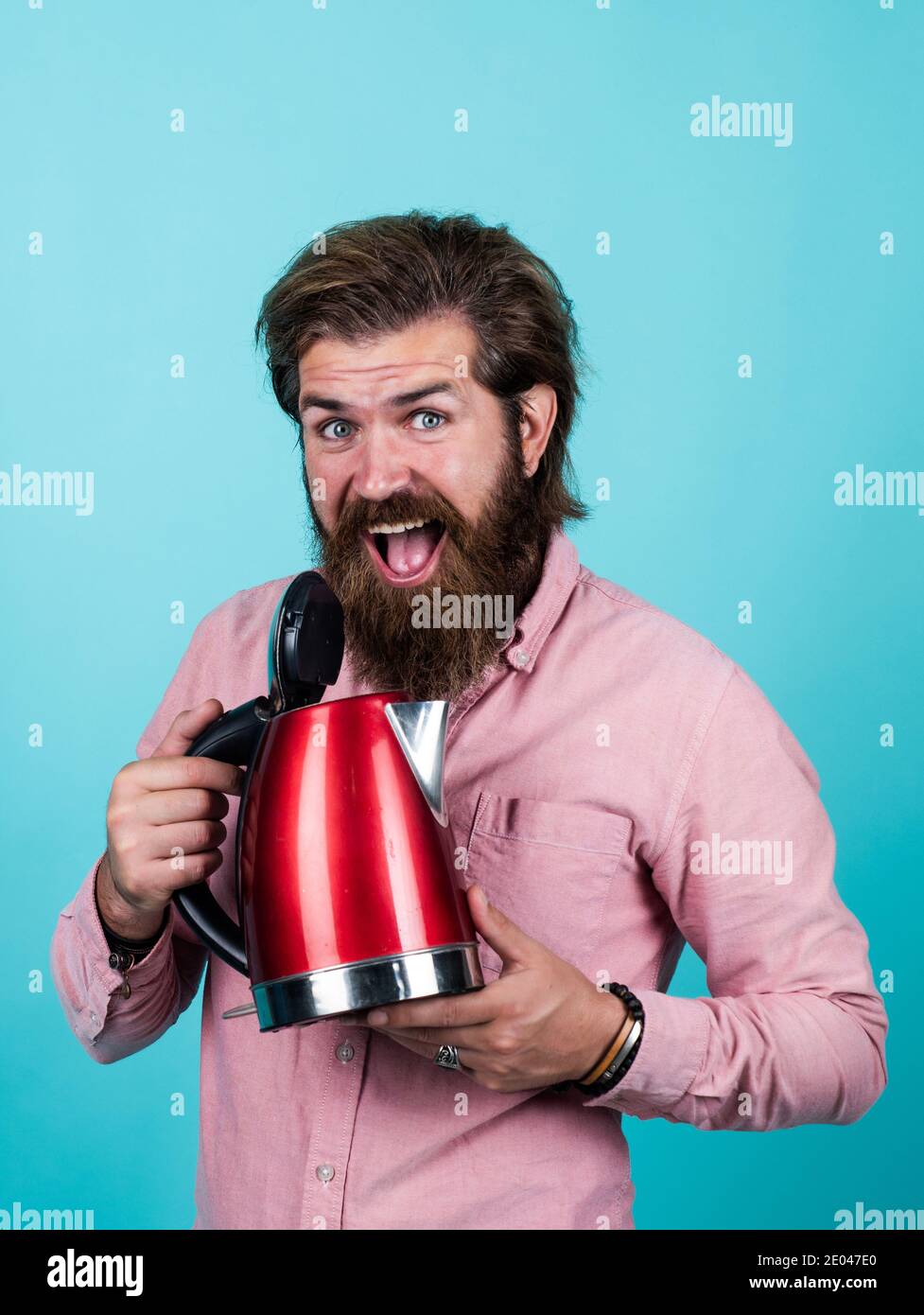 his choise. happy hipster with moustache boil water. male householding ...