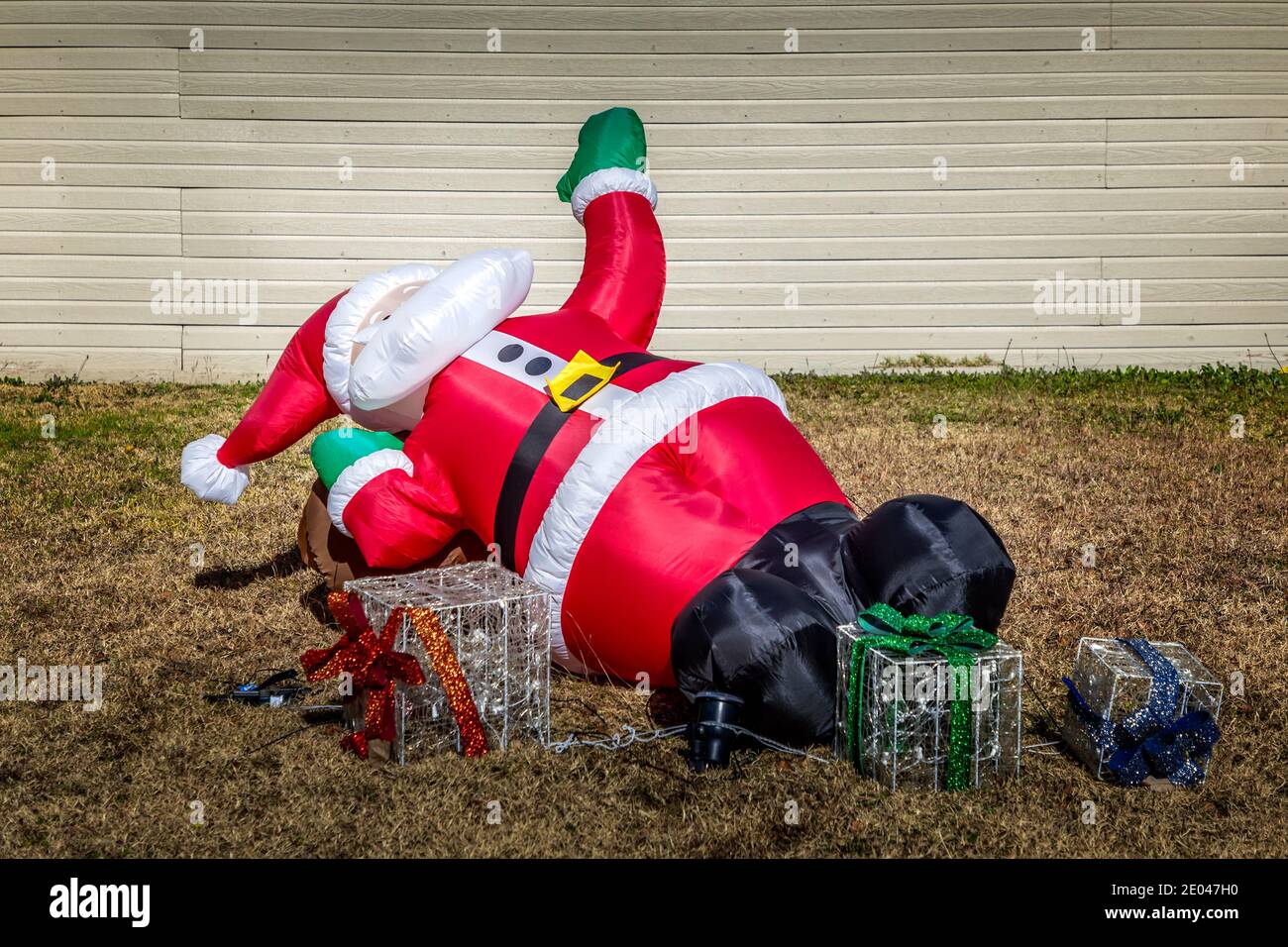 Santa Claus after Christmas with a huge hangover Stock Photo - Alamy